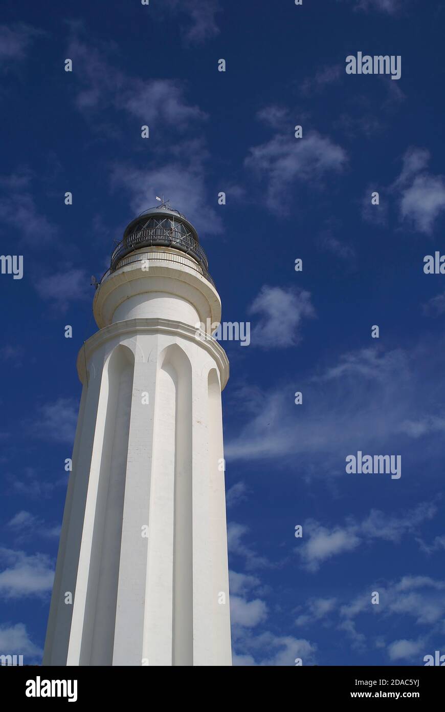 Trafalgar lighthouse over blue sky in Barbate, Cadiz. Andalusia, Spain ...