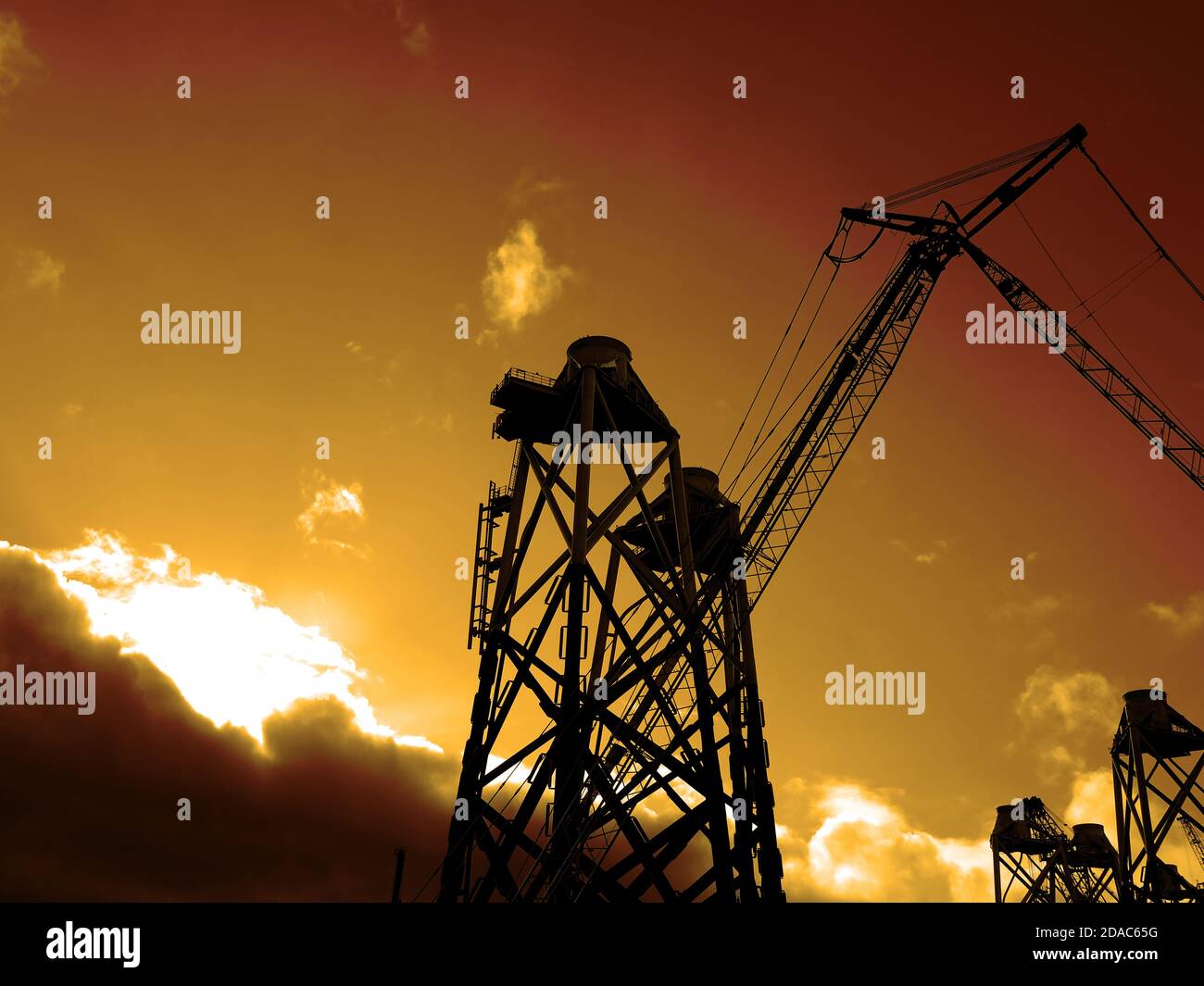 Wind turbine fabrication and cranes at sunset in Smulders Howdon on ...