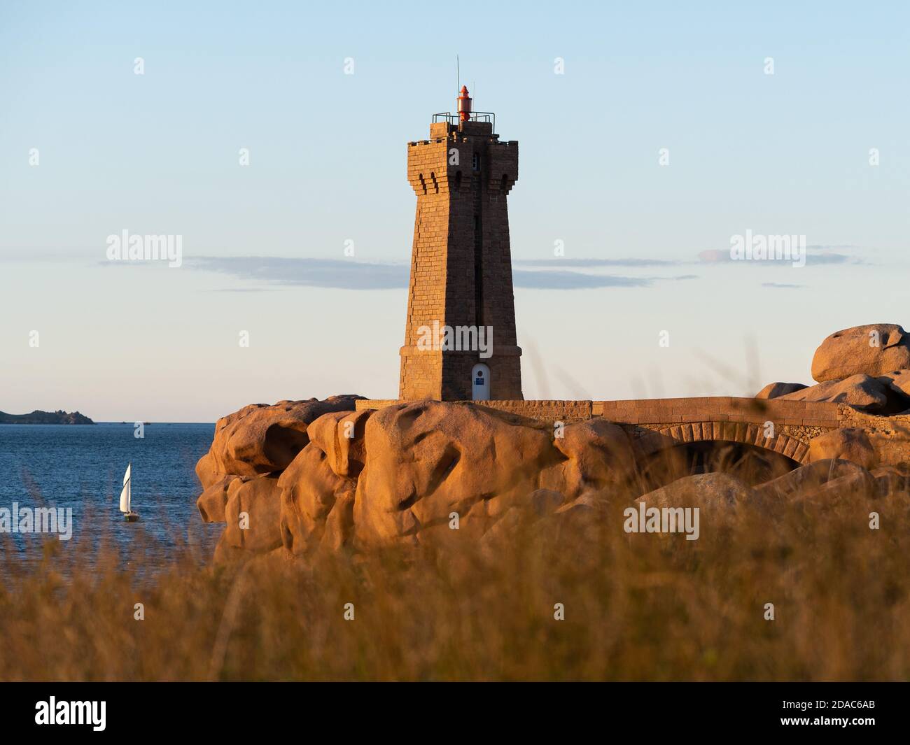 The pink granite lighthouse of Ploumanac'h (Brittany, France) stands in ...