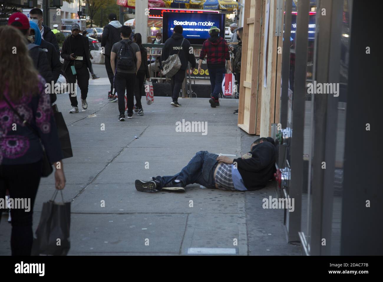 Homeless Man Sleeping On Sidewalk High Resolution Stock Photography and ...