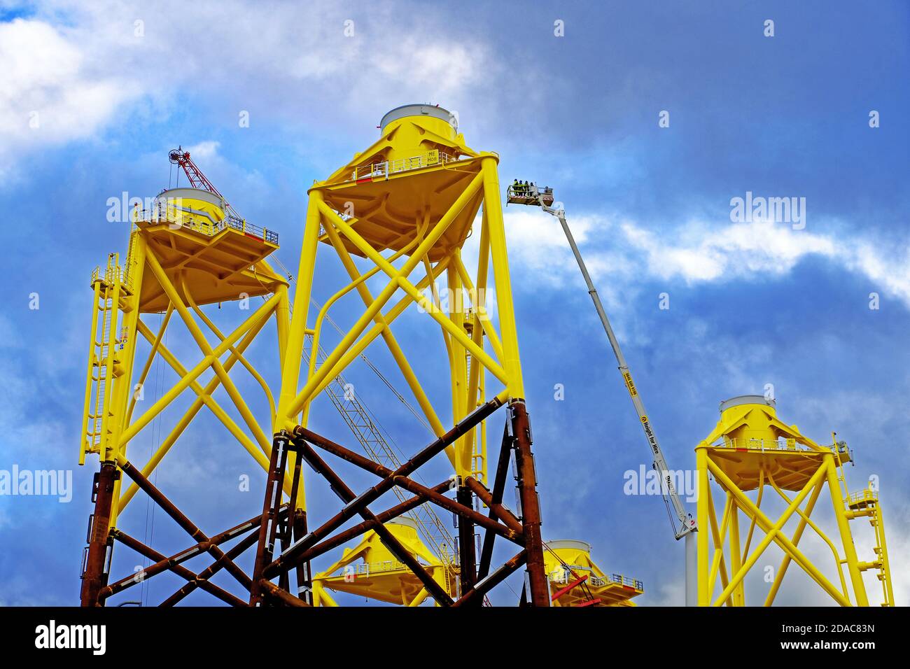 Wind turbine fabrication and cherry picker inspection crew at Smulders ...
