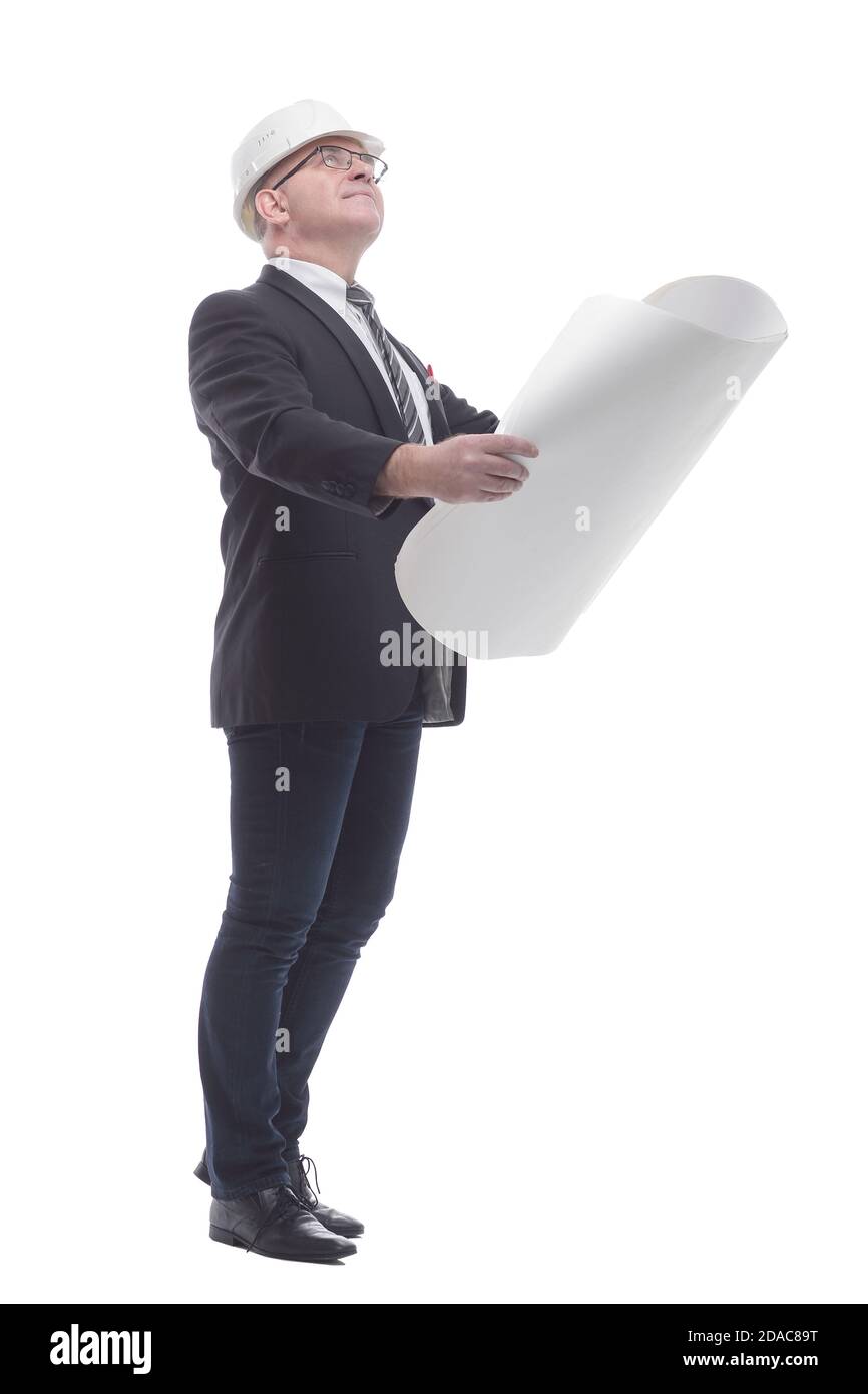side view. smiling architect reading a new drawing Stock Photo - Alamy