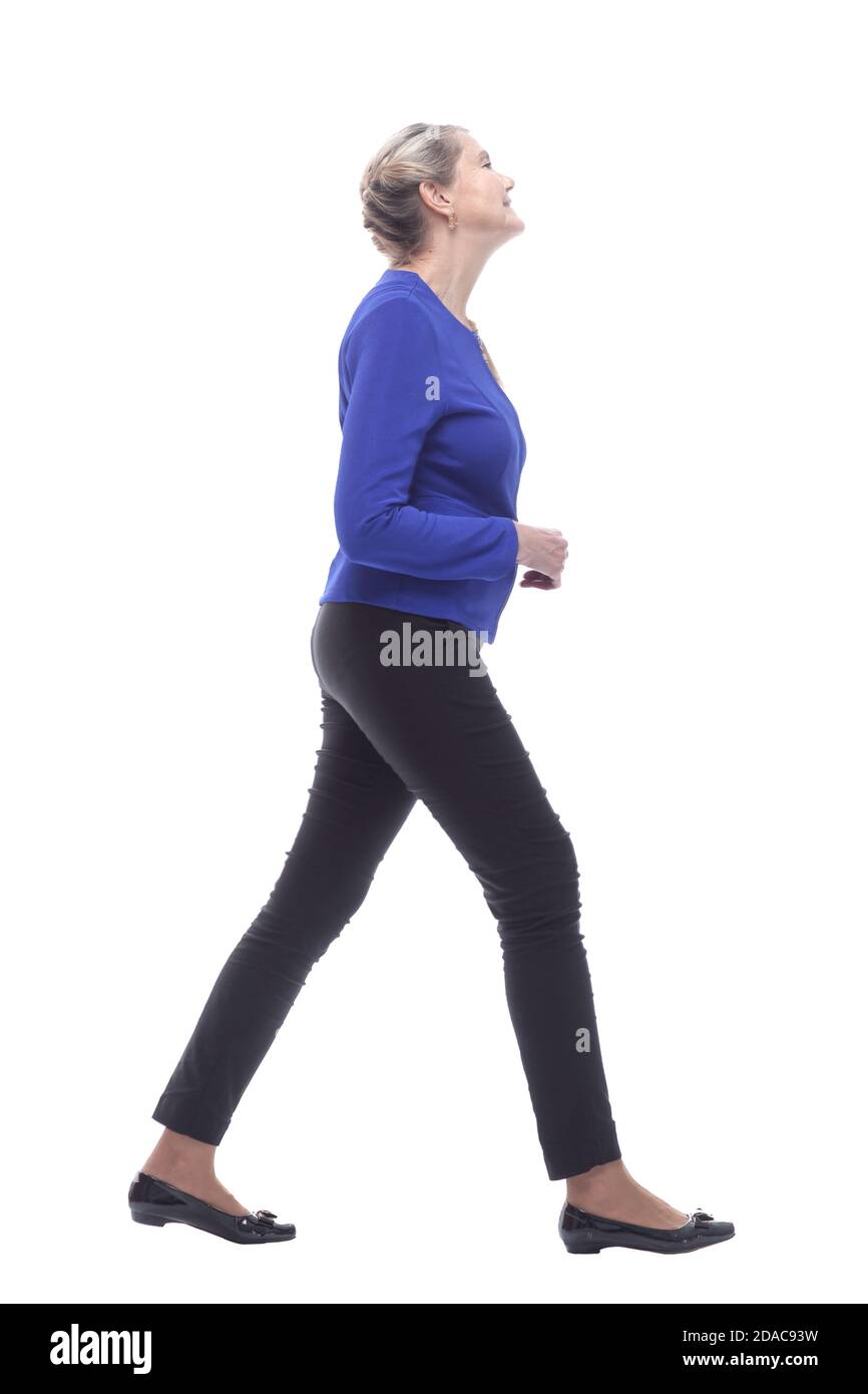 side view. adult attractive woman stepping forward Stock Photo - Alamy