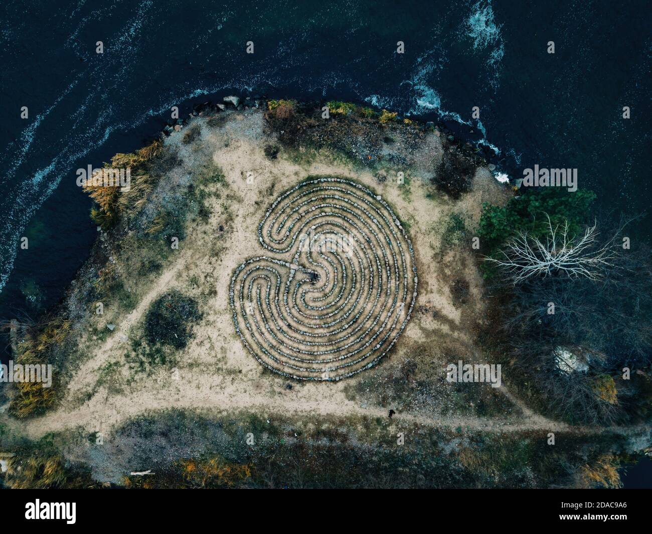 Spiral labyrinth made of stones on the coast, top view from drone Stock ...