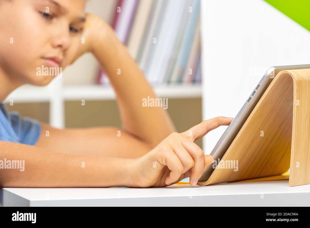 Teenage boy using digital tablet computer. Online learning, remote ...