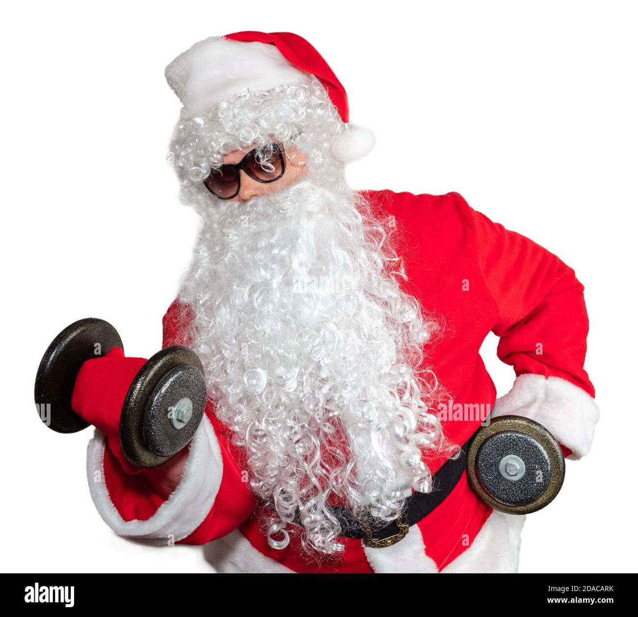 Santa Claus working out with two dumbbells and doing bicep curls. Santa ...