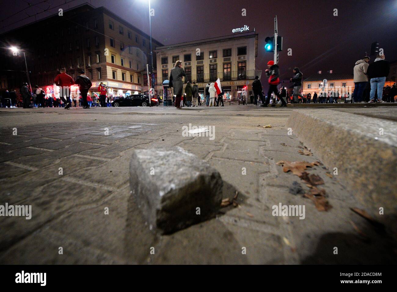 A brick is seen lying on the street where clashes took place between ...