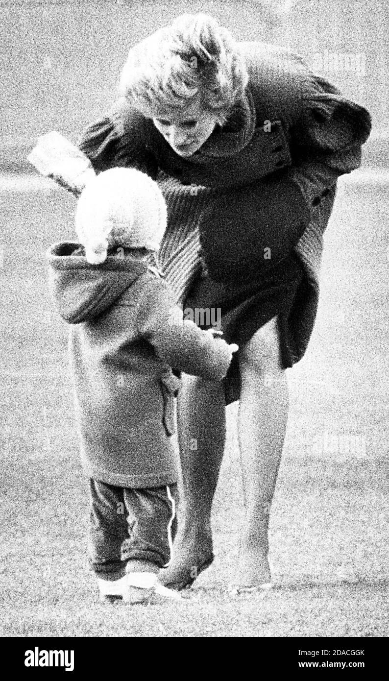 PRINCESS DIANA IS PRESENTED WITH FLOWERS BY 3 YEAR OLD CARLY ATKINSON ...