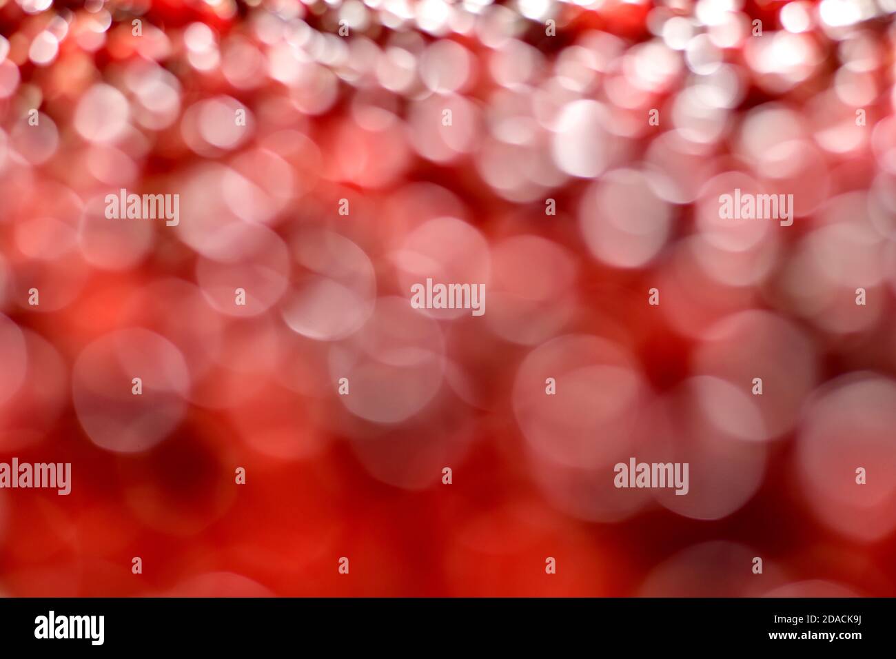 The background is with bright red and white circles, of varying sizes ...