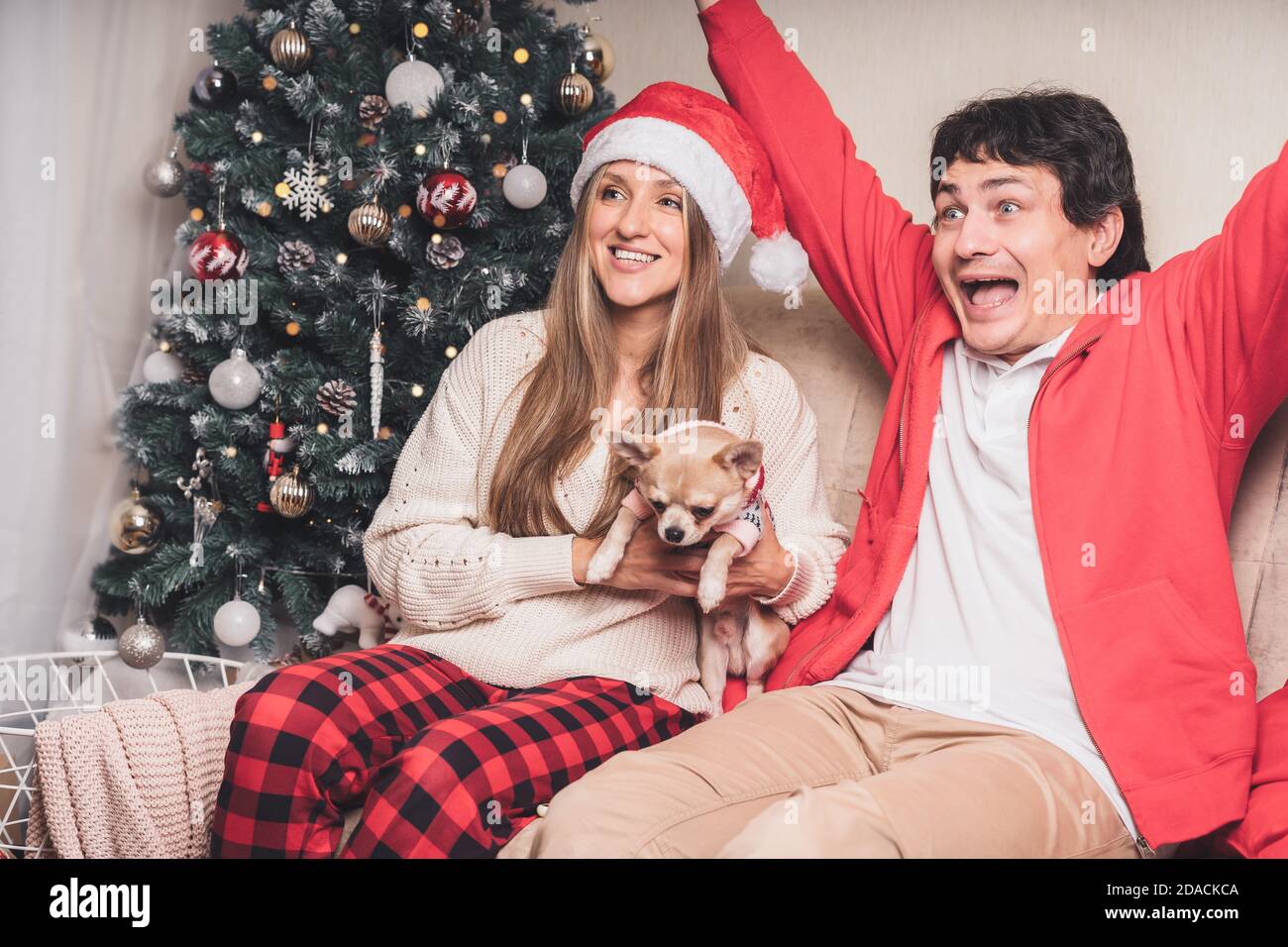 Santa watching tv hi-res stock photography and images - Alamy