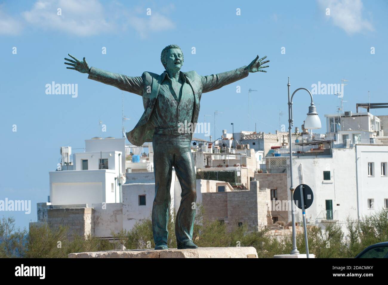 The bronze statue of the popular italian singer Domenico Modugno in his ...