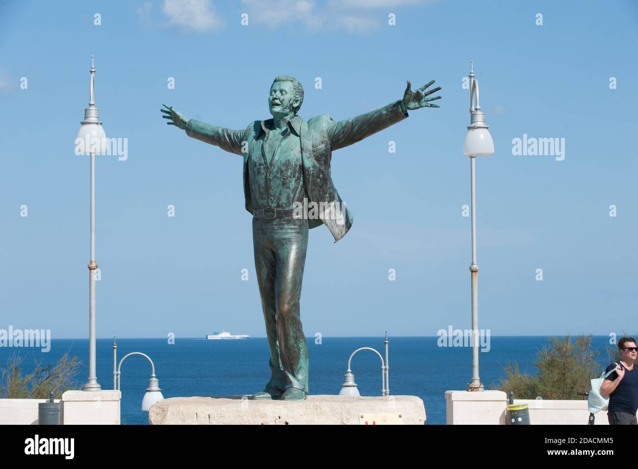 The bronze statue of the popular italian singer Domenico Modugno in his ...