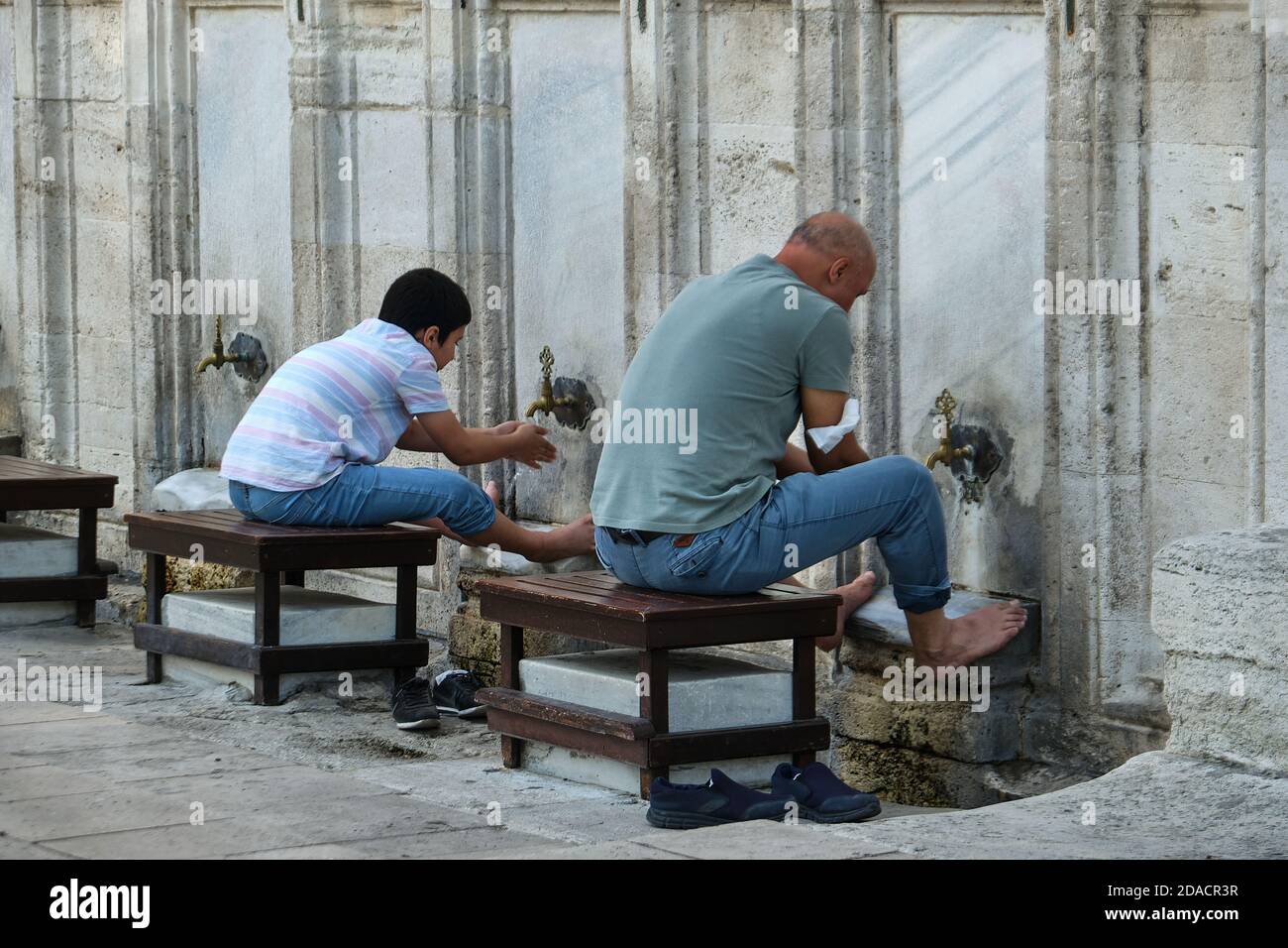Muslim washing hands hi-res stock photography and images - Alamy