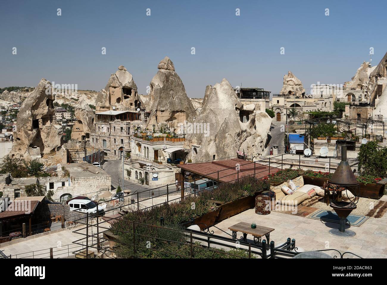 Landscape view of boutique cave hotels with stylish patios built from ...