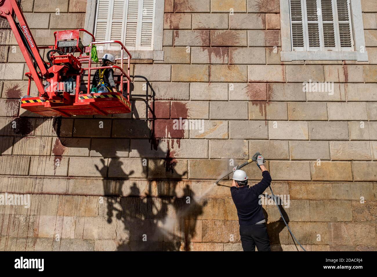 People Cleaning Walls