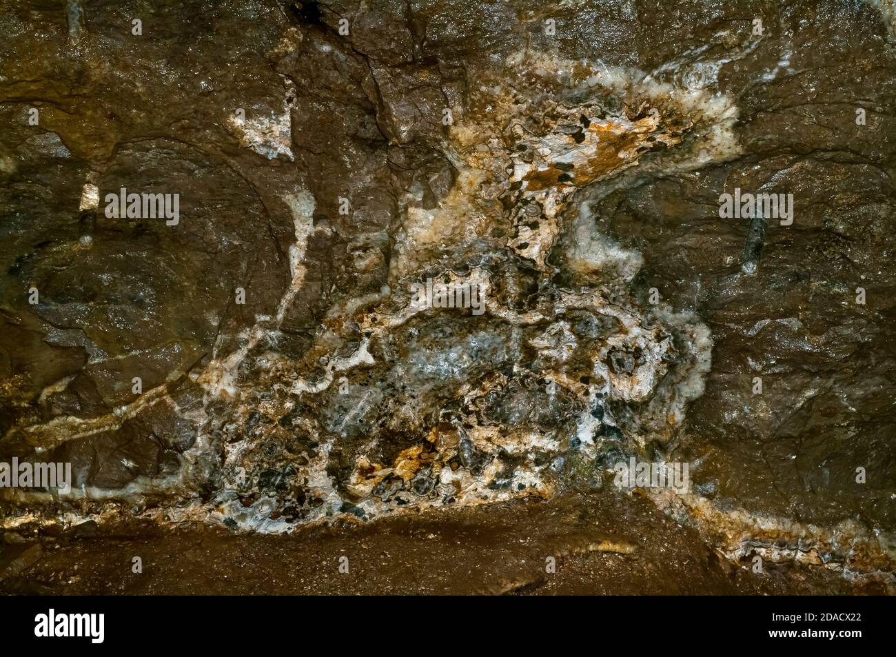 Complex deposit of minerals in a 'pipe' formation in an old lead mine ...