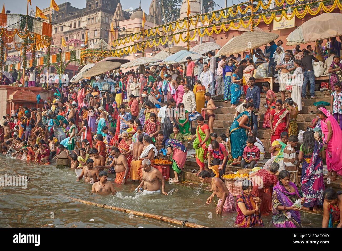 Varanasi, India, November 2015. A crowd in a sacred ritual bath in a ...
