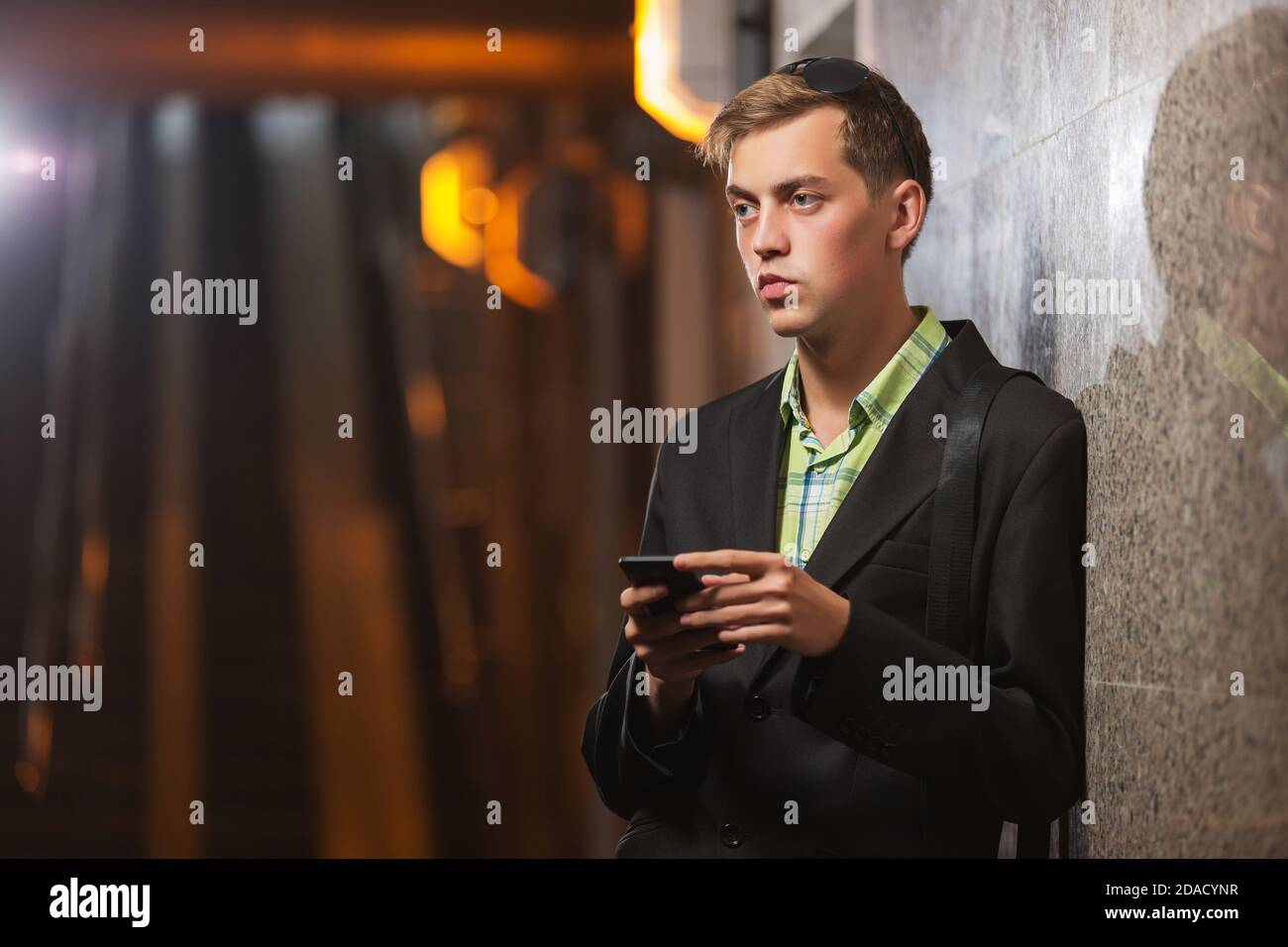 Young handsome business man using smart phone Stylish fashion male ...