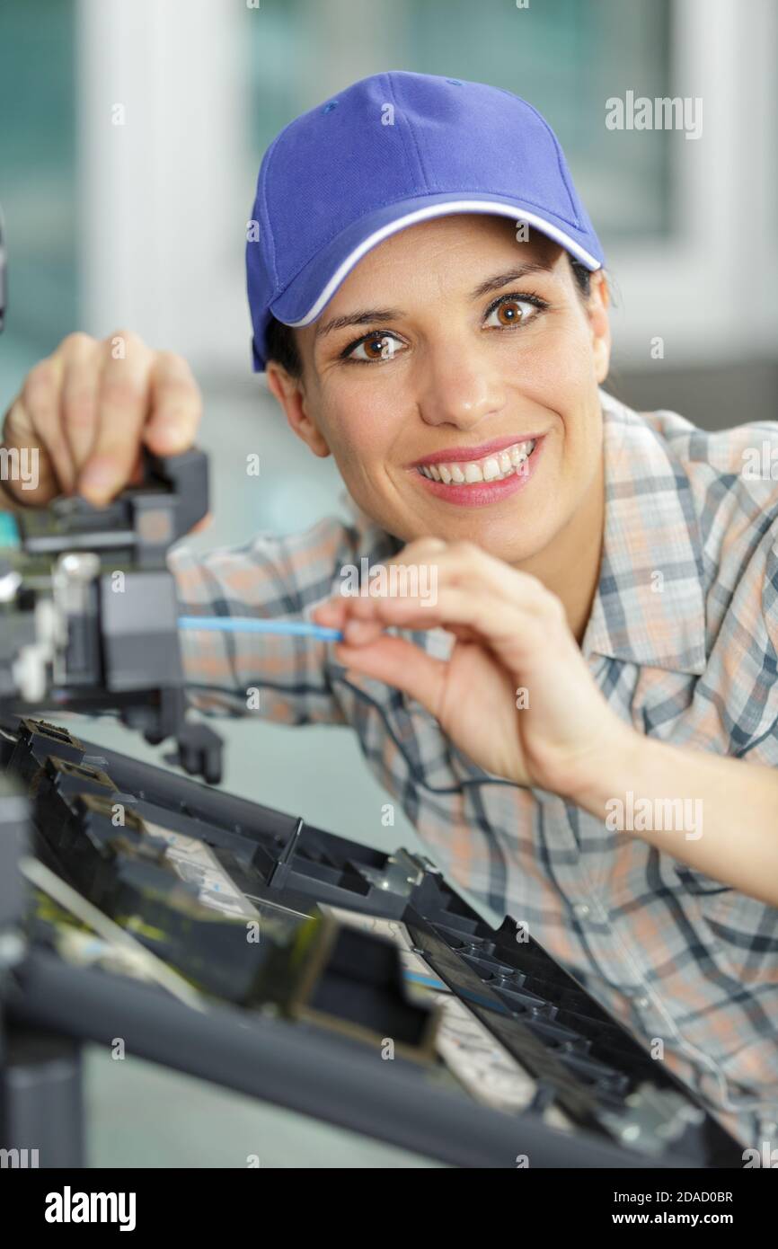 happy mechanic repairing the car engine Stock Photo - Alamy