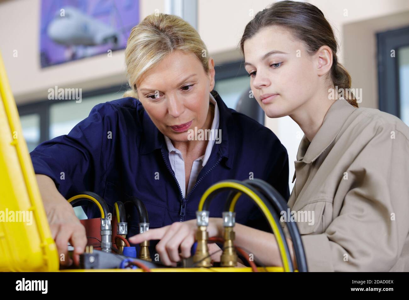 portrait of women working with cables Stock Photo - Alamy