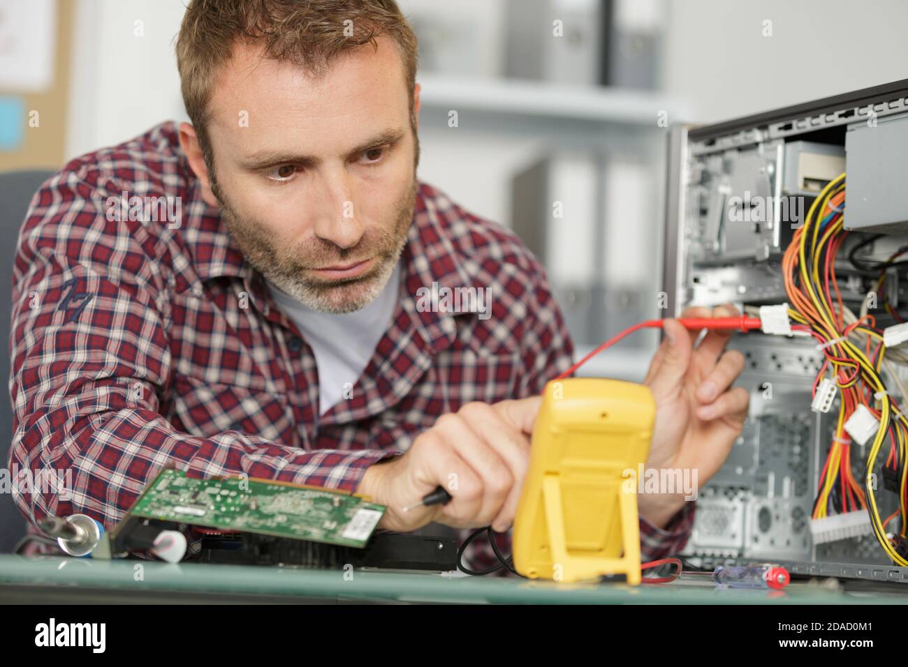 technician using voltage meter for voltage measurement Stock Photo - Alamy