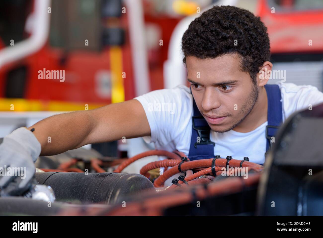 teenage male mechanic at work Stock Photo - Alamy