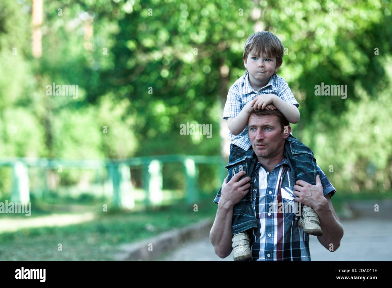 Young father and his little son on the street Stock Photo - Alamy