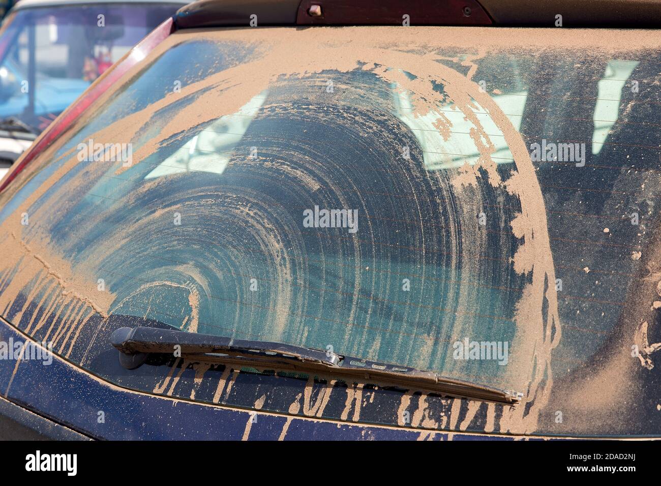 dirty car suv covered with a dry layer of dust from soil smeared with a ...