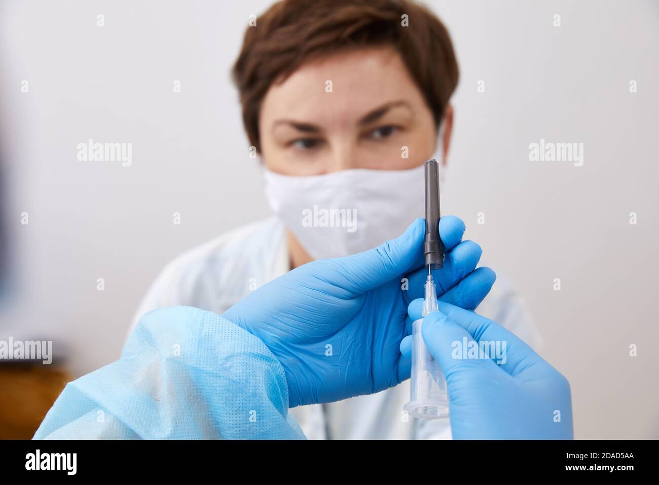 Nurse taking blood sample to make a test in laboratory Stock Photo - Alamy