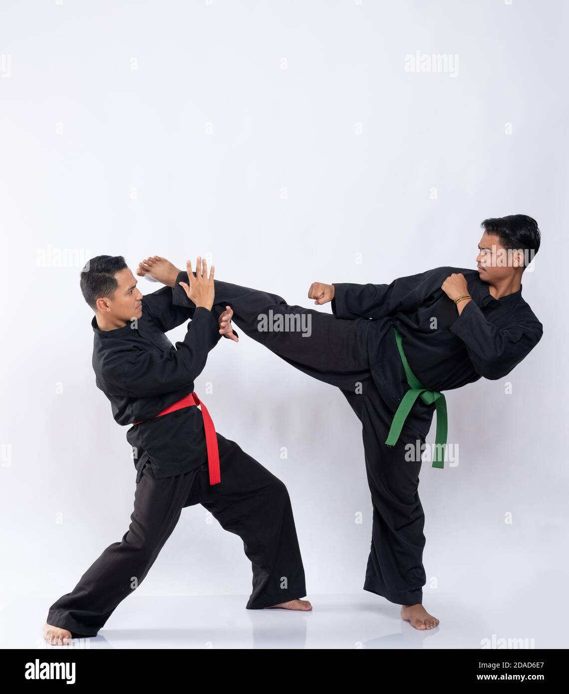 Men wearing pencak silat hi-res stock photography and images - Alamy