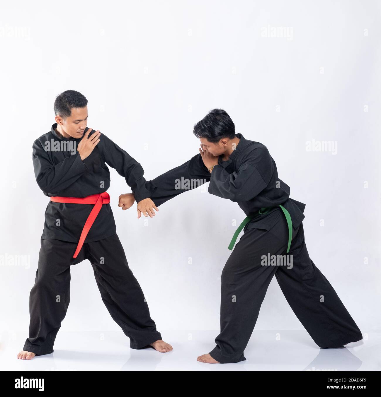 Men wearing pencak silat hi-res stock photography and images - Alamy