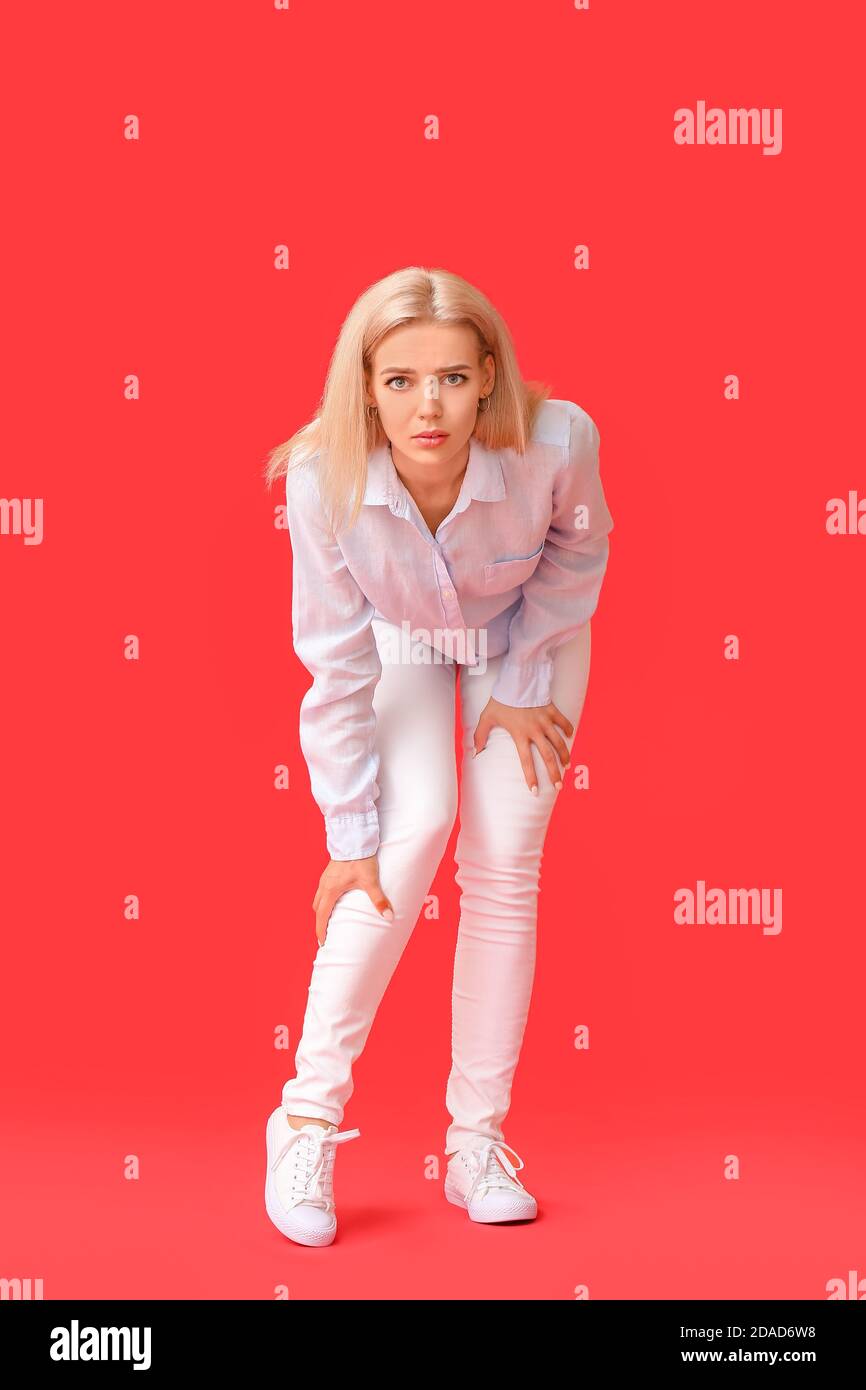 Woman with problem of limbs numbness on color background. Diabetes ...