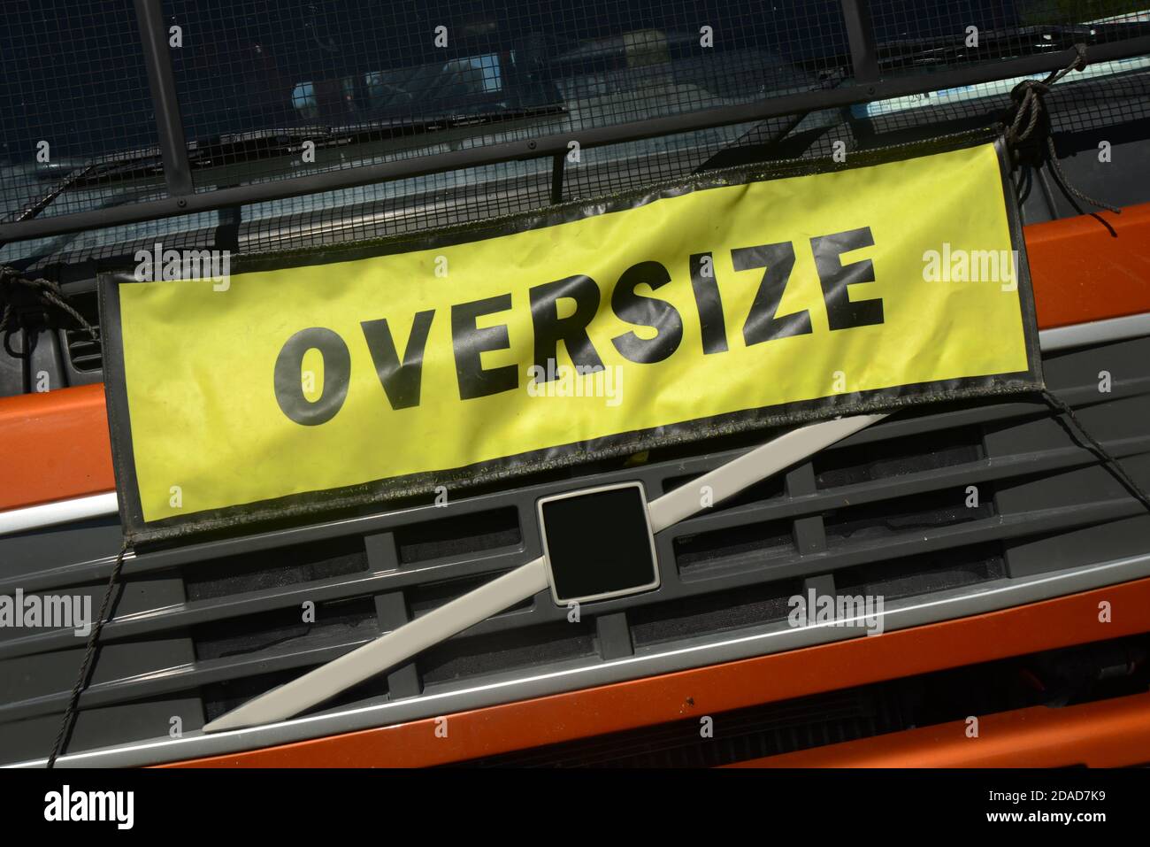 oversize signage displayed on the front of a truck Stock Photo - Alamy