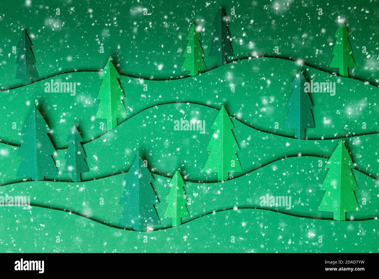 3D pop out Christmas trees paper artwork in green background with ...