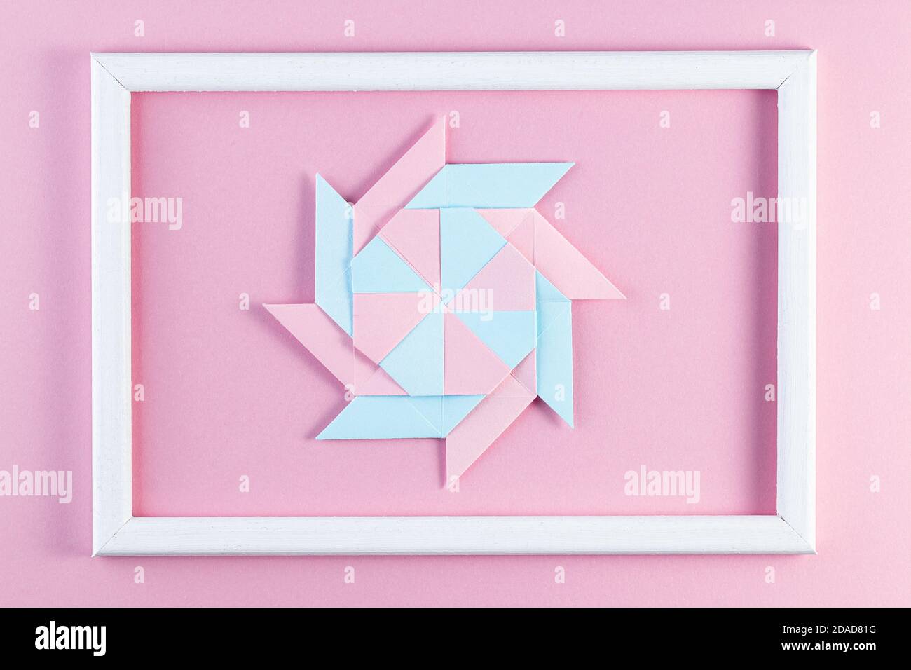 Origami Star. Made with square sheets of paper and white wood frame ...
