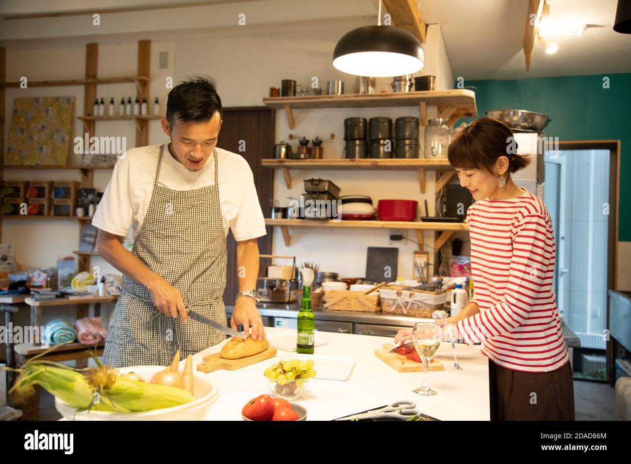 Lovers cooking together in kitchen hi-res stock photography and images ...