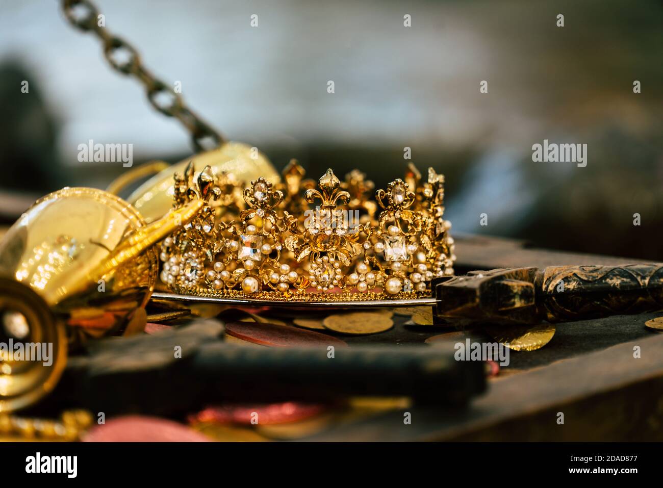 Antique treasure gold crown with coins for wealth , luxury and success ...