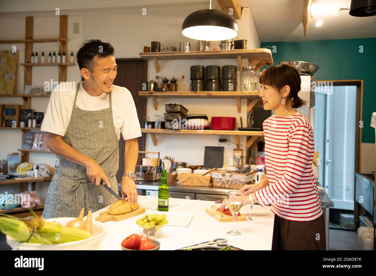 Lovers cooking together in kitchen hi-res stock photography and images ...
