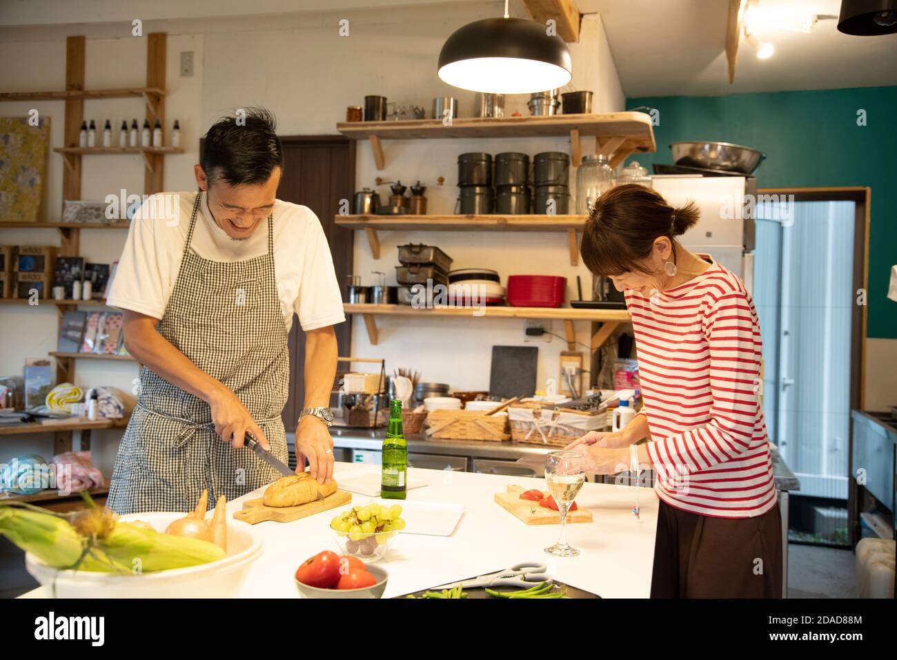 Lovers cooking together in kitchen hi-res stock photography and images ...