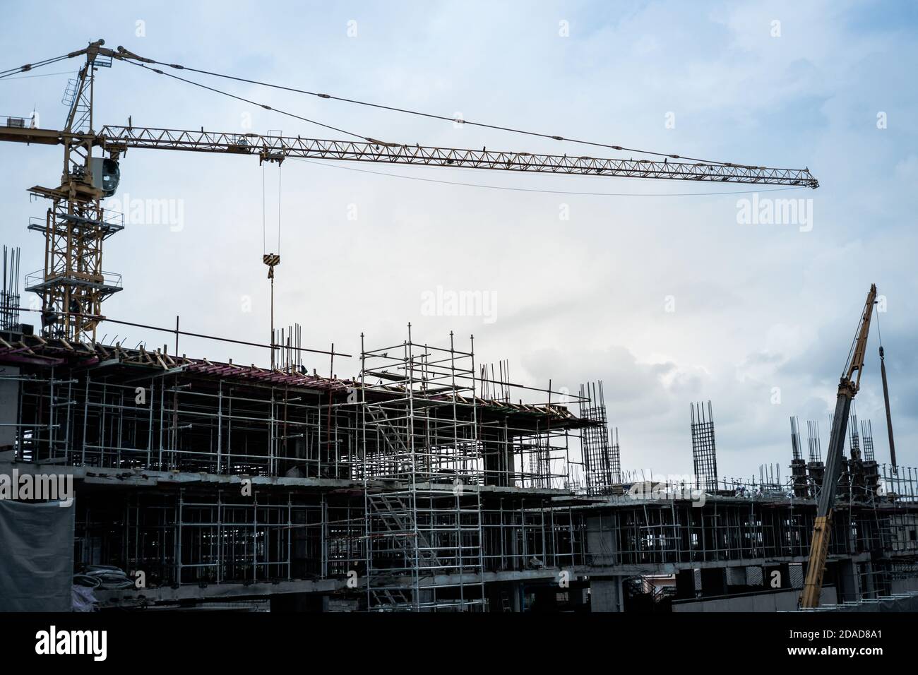 Building construction with crane Stock Photo - Alamy