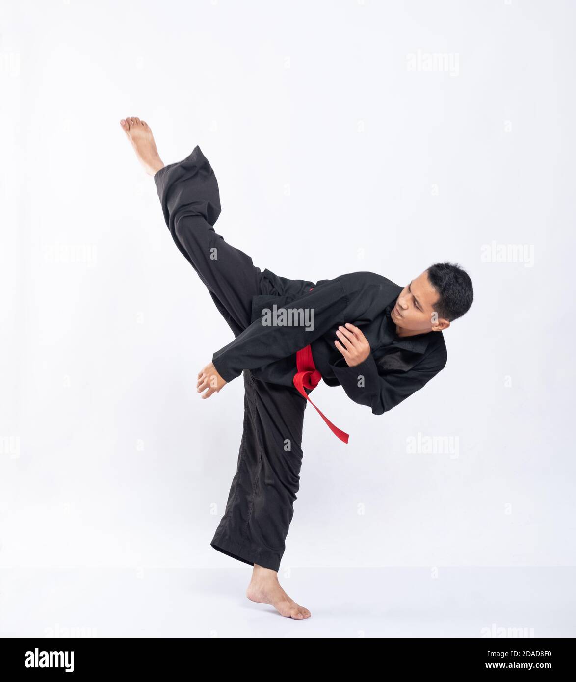 Kicking pose hi-res stock photography and images - Alamy