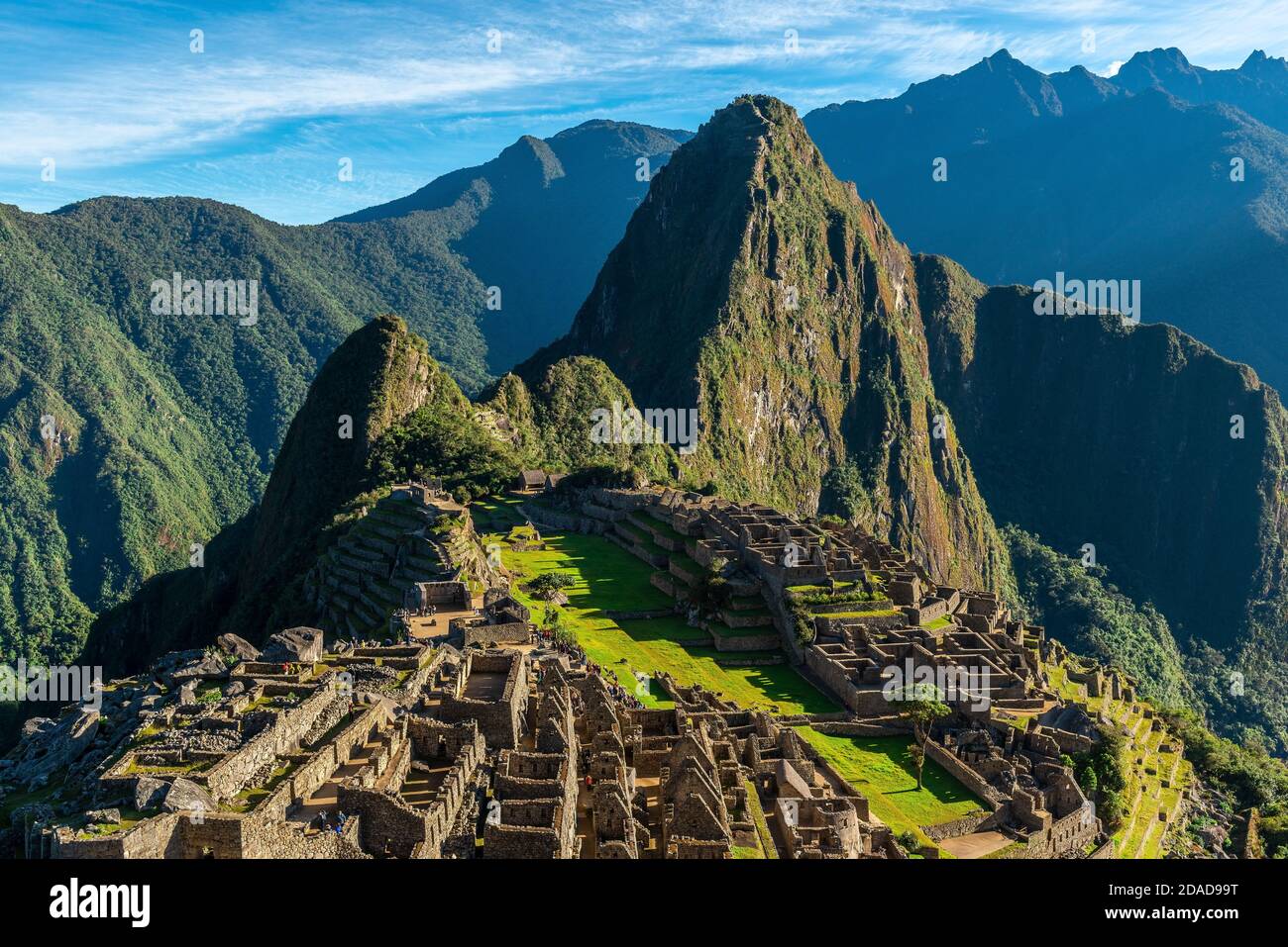 The Inca ruin of Machu Picchu at sunrise with Huayna Picchu peak, Cusco ...