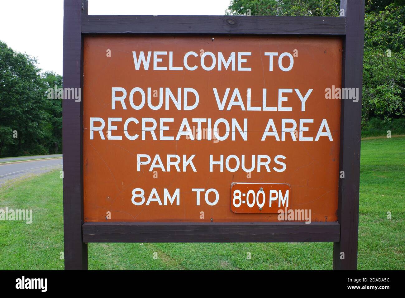 The wooden sign of Round Valley Recreation Area marked entrance of ...