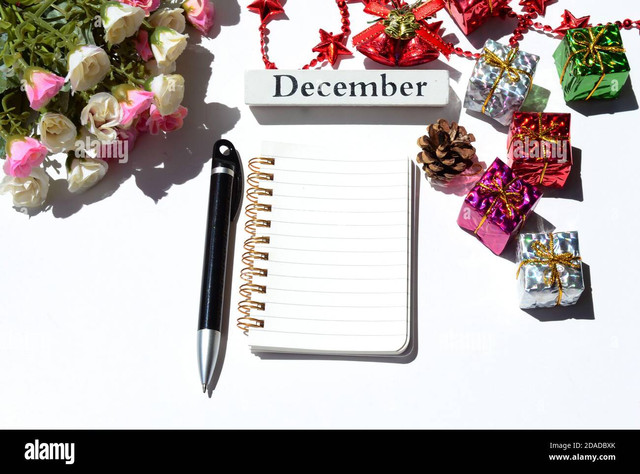 Christmas concept with notepad and christmas decorations background ...