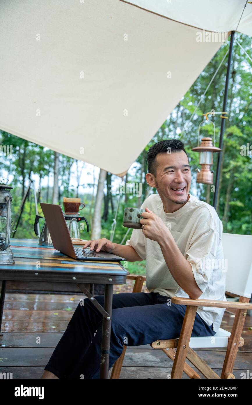 Work on Vacation as New Normal Work Style Stock Photo - Alamy