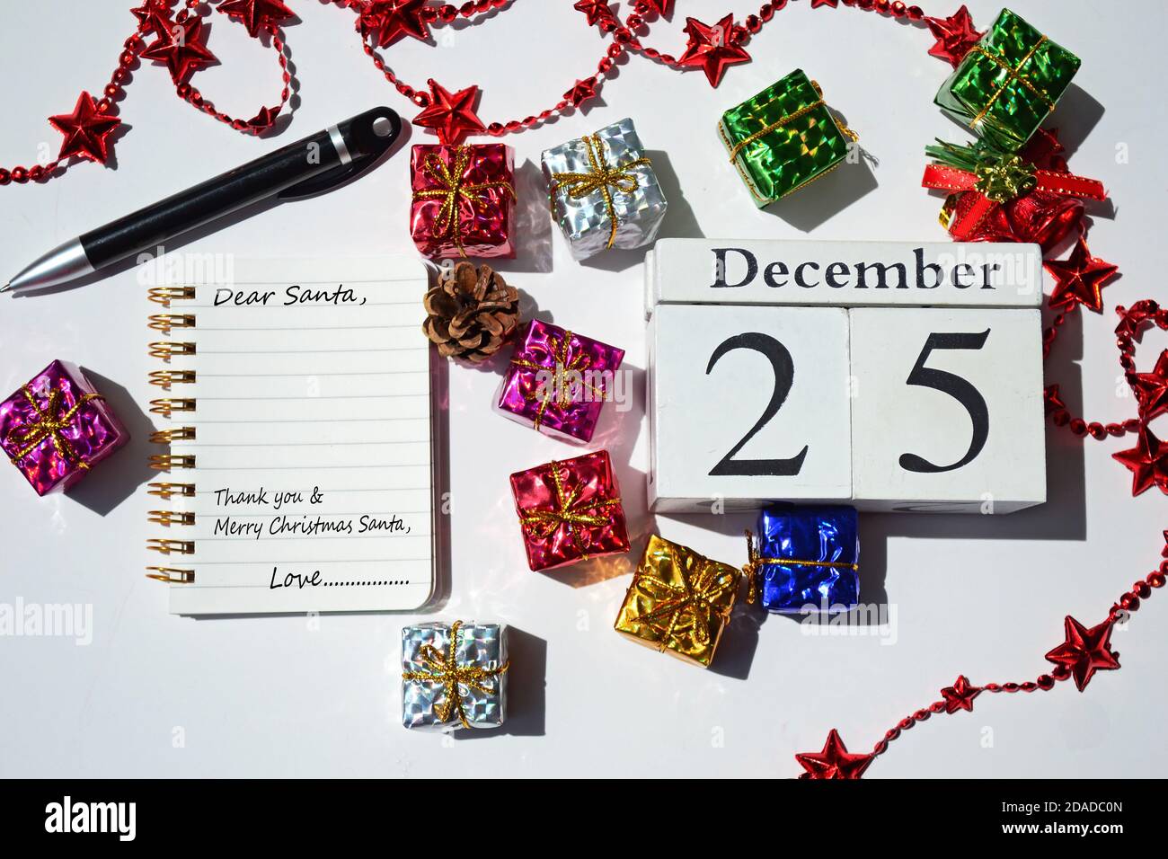 Image with wordings on notepad with christmas decorations background ...