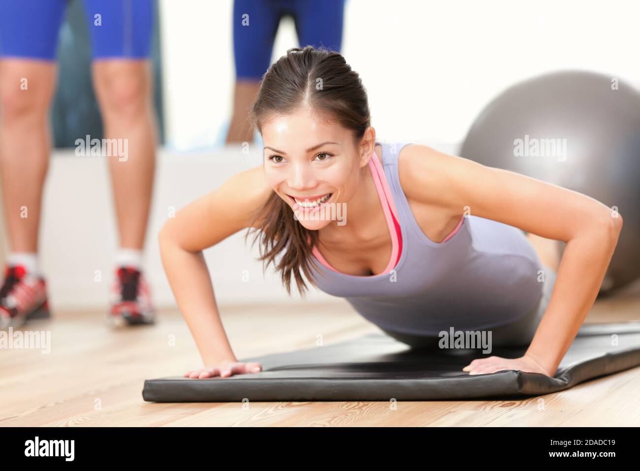 Gym woman working out Stock Photo - Alamy