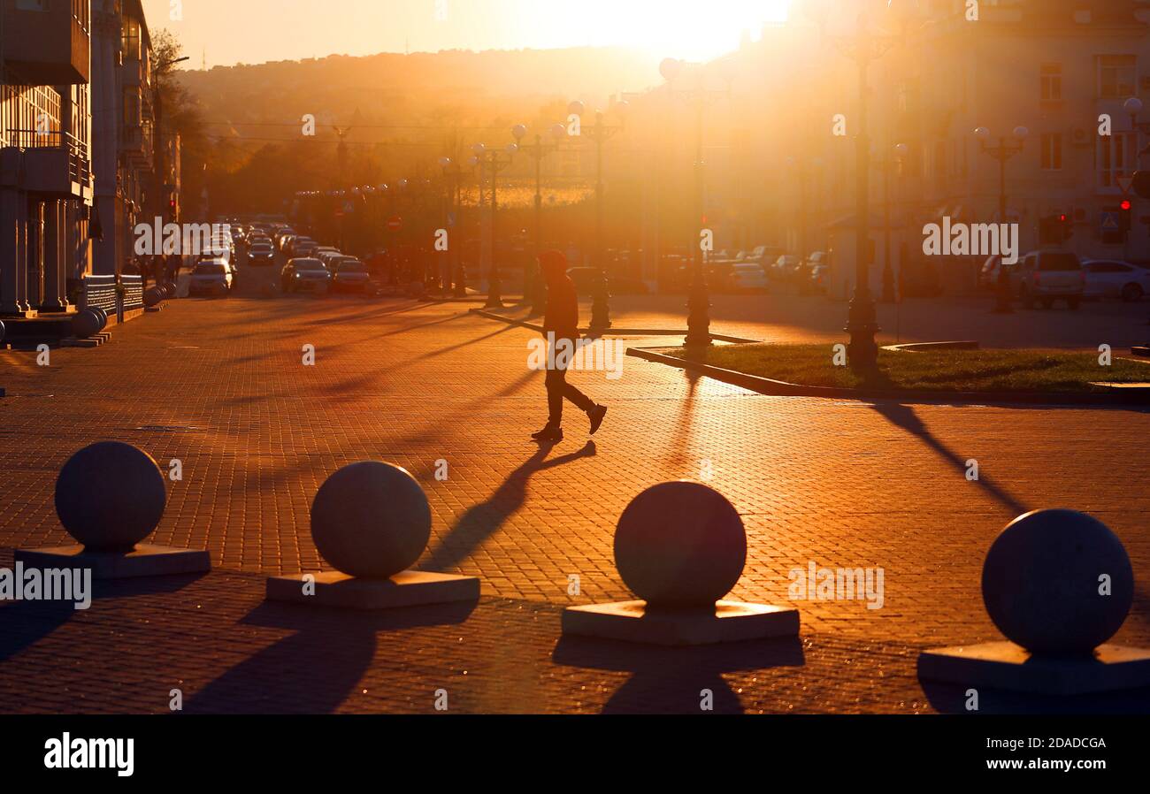 Photo sunset walk along the embankment in autumn sunny evening Stock ...