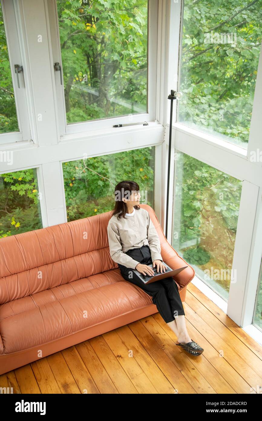 Teleworking sofa hi-res stock photography and images - Alamy