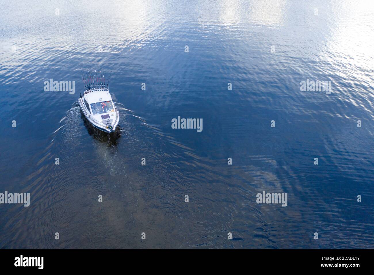 Aerial view fisherman on boat at the ocean. Top view beautiful seascape ...